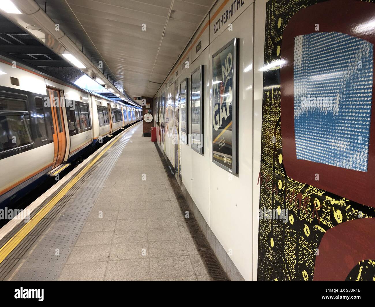 London Overground station narrow platform at Rotherhithe station with ...