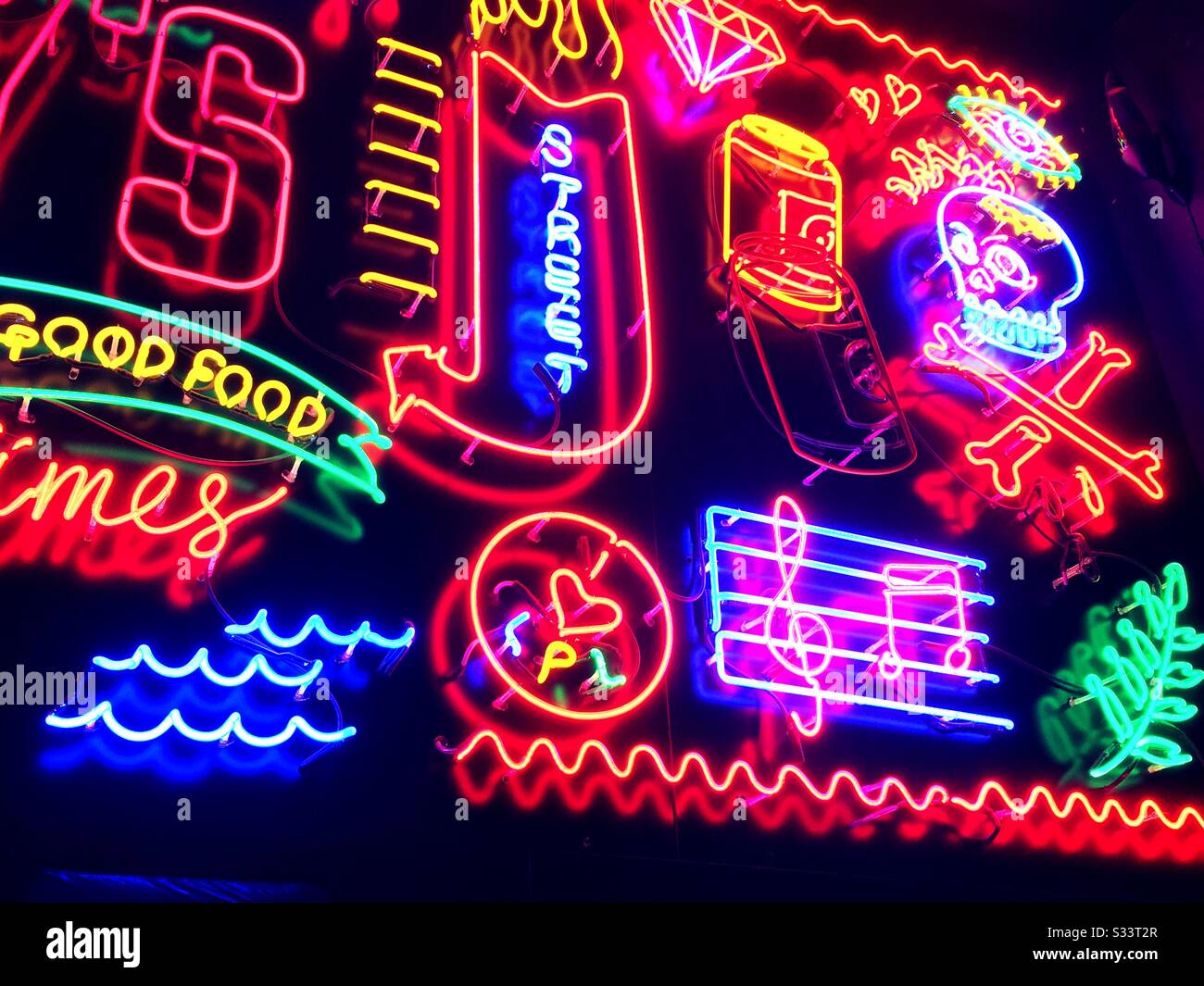 Neon wall in Liverpool bar colourful sign Stock Photo - Alamy