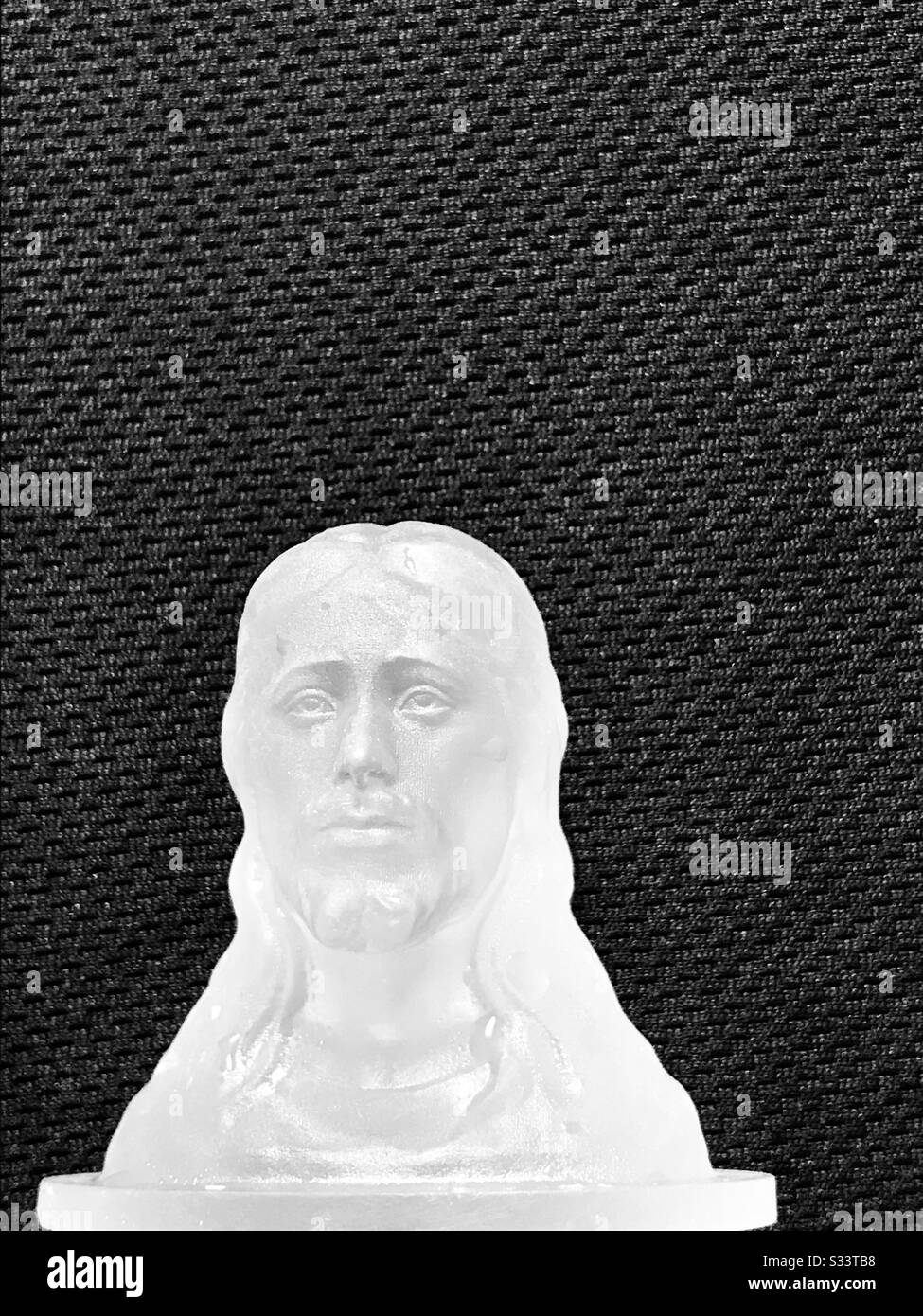 3D Printing of Jesus face on black background -Plastic manufacturing ...