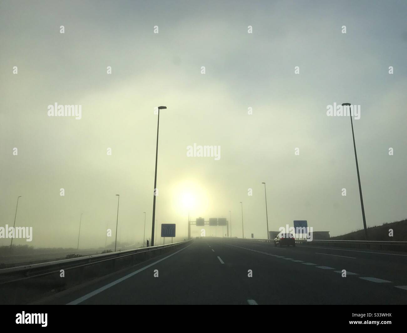 Driving in the mist Stock Photo - Alamy