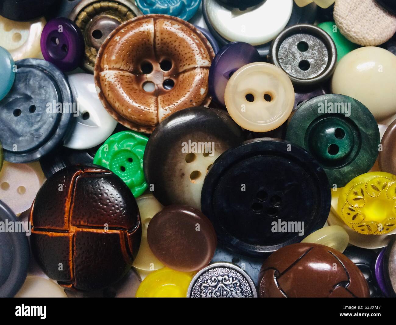 Vintage buttons hi-res stock photography and images - Alamy