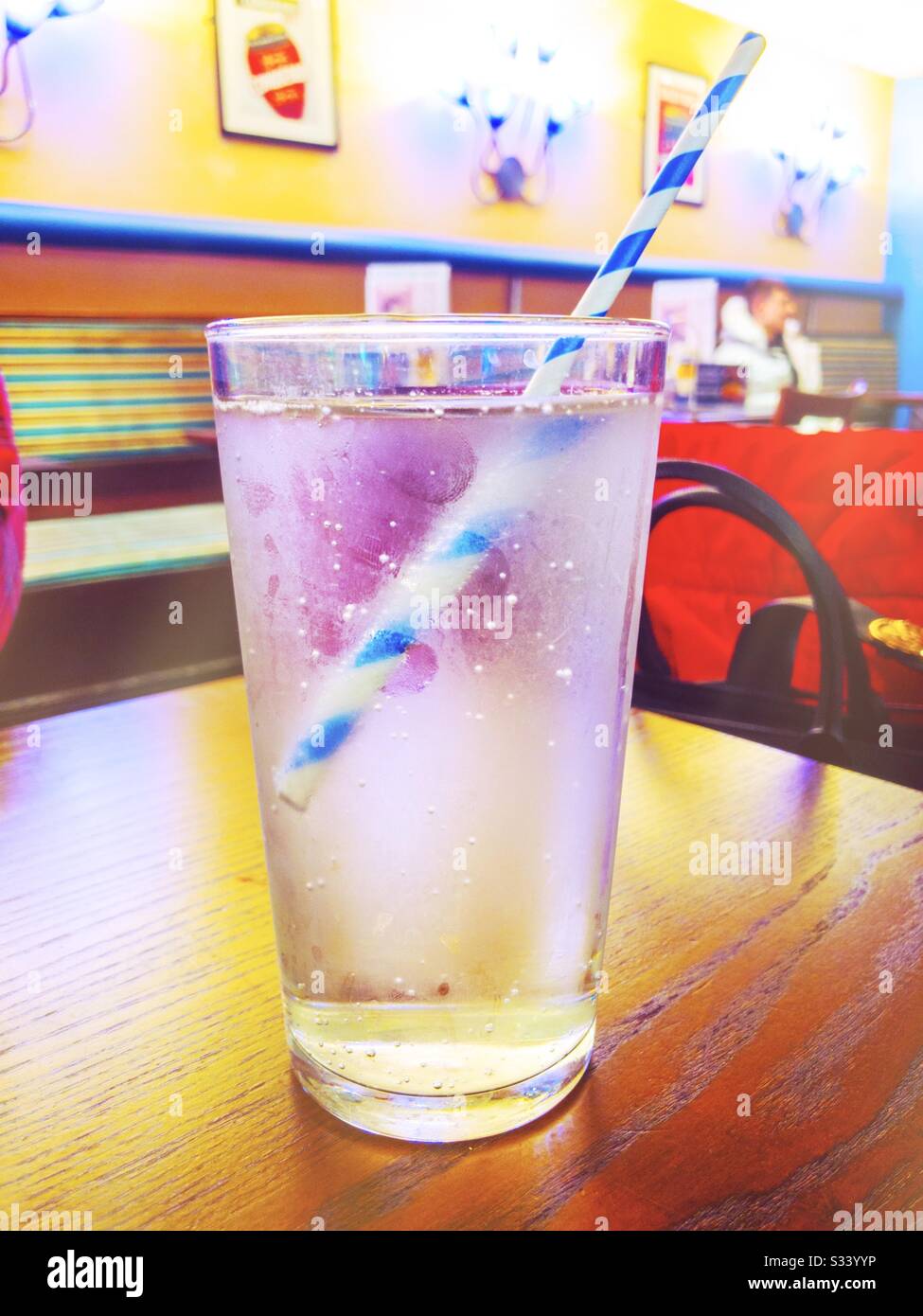 Glass of lemonade with a drinking straw Stock Photo - Alamy