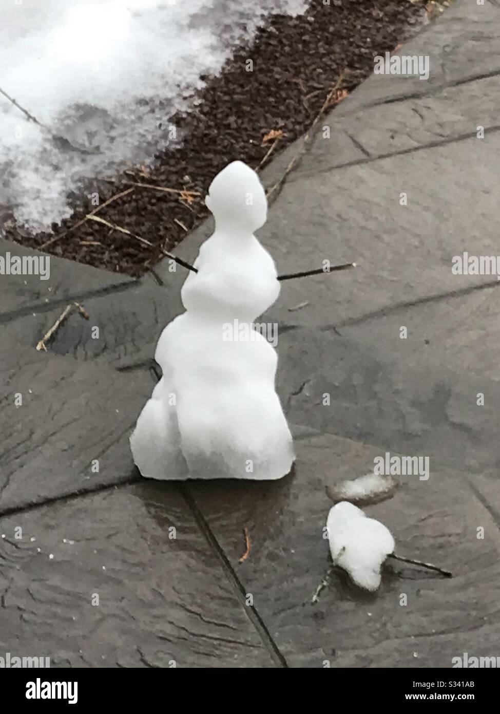 Melting snowman spring hi-res stock photography and images - Alamy