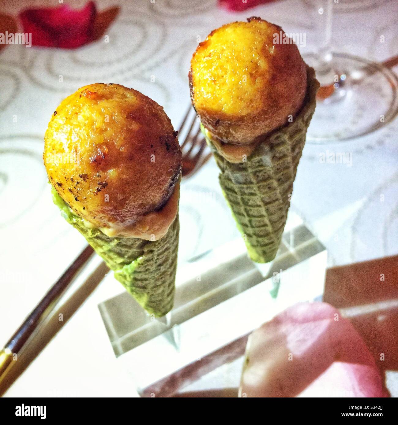 Amuse Bouche: two warm scoops of chicken satay on wafer cones with ...