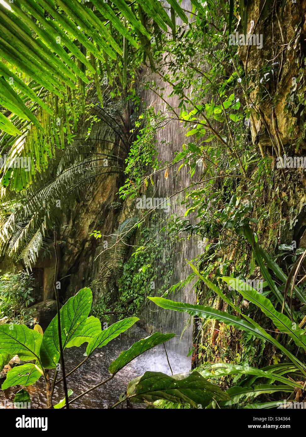 A waterfall on the jungle walk between The Banjaran Hotsprings Retreat ...
