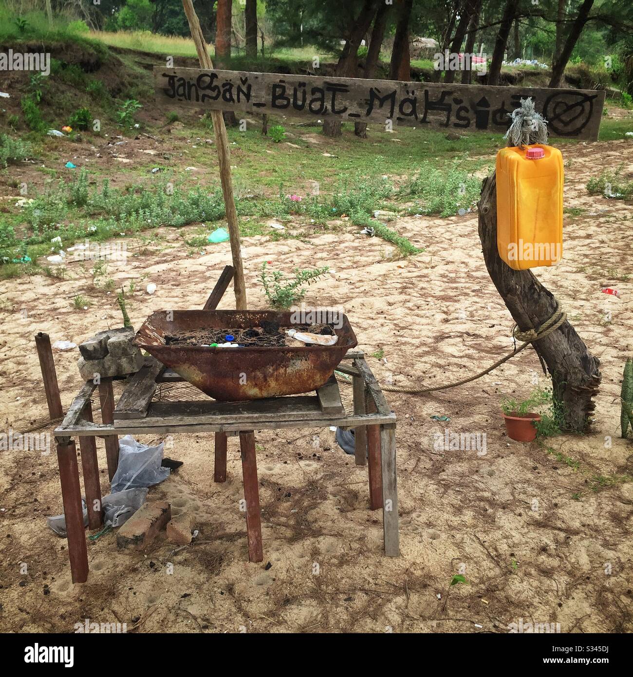 Rustic playground and resort recreation area on the beach, Batu Rakit ...