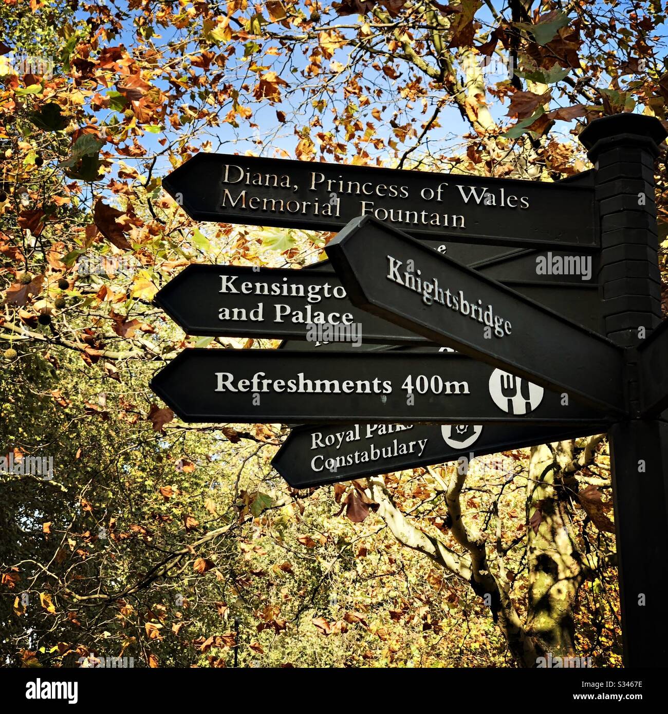 A close up shot of a direction tourist information signpost showing ...