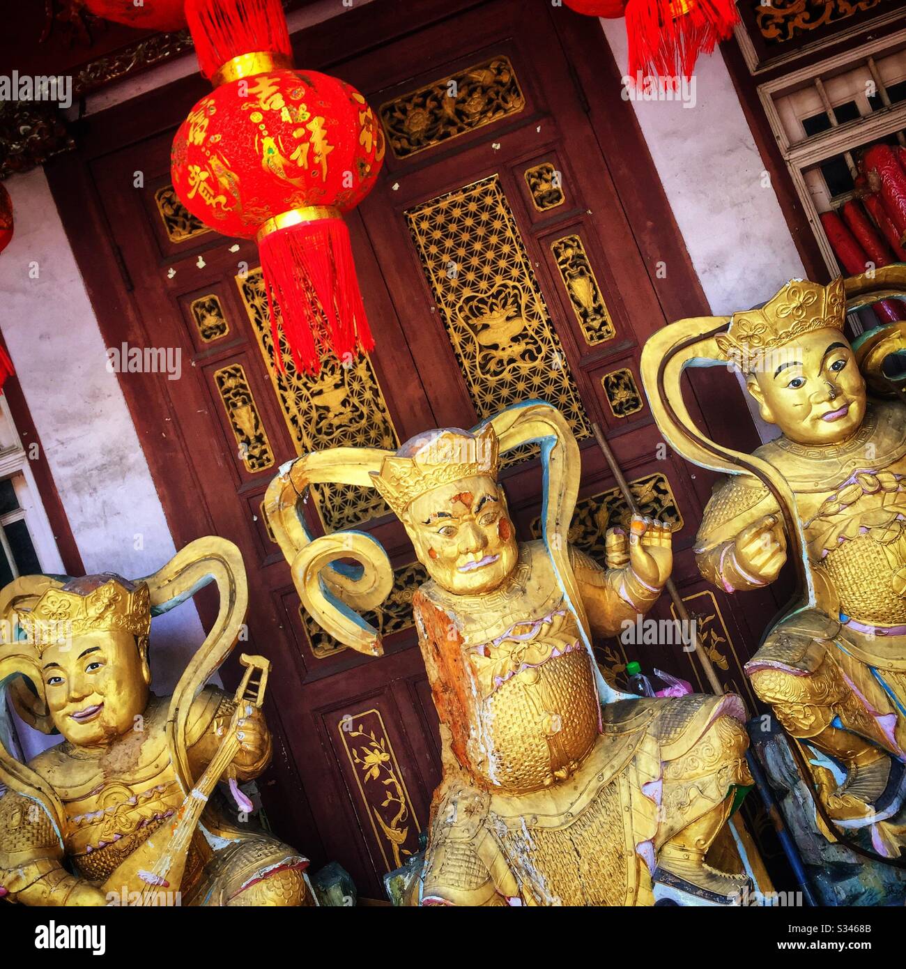 Gold-painted statues outside Bee Chin Heong, a supplier of Chinese ...