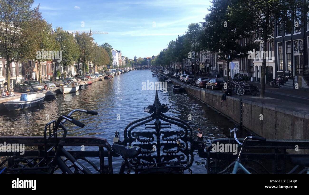 Water canal in Amsterdam Stock Photo - Alamy