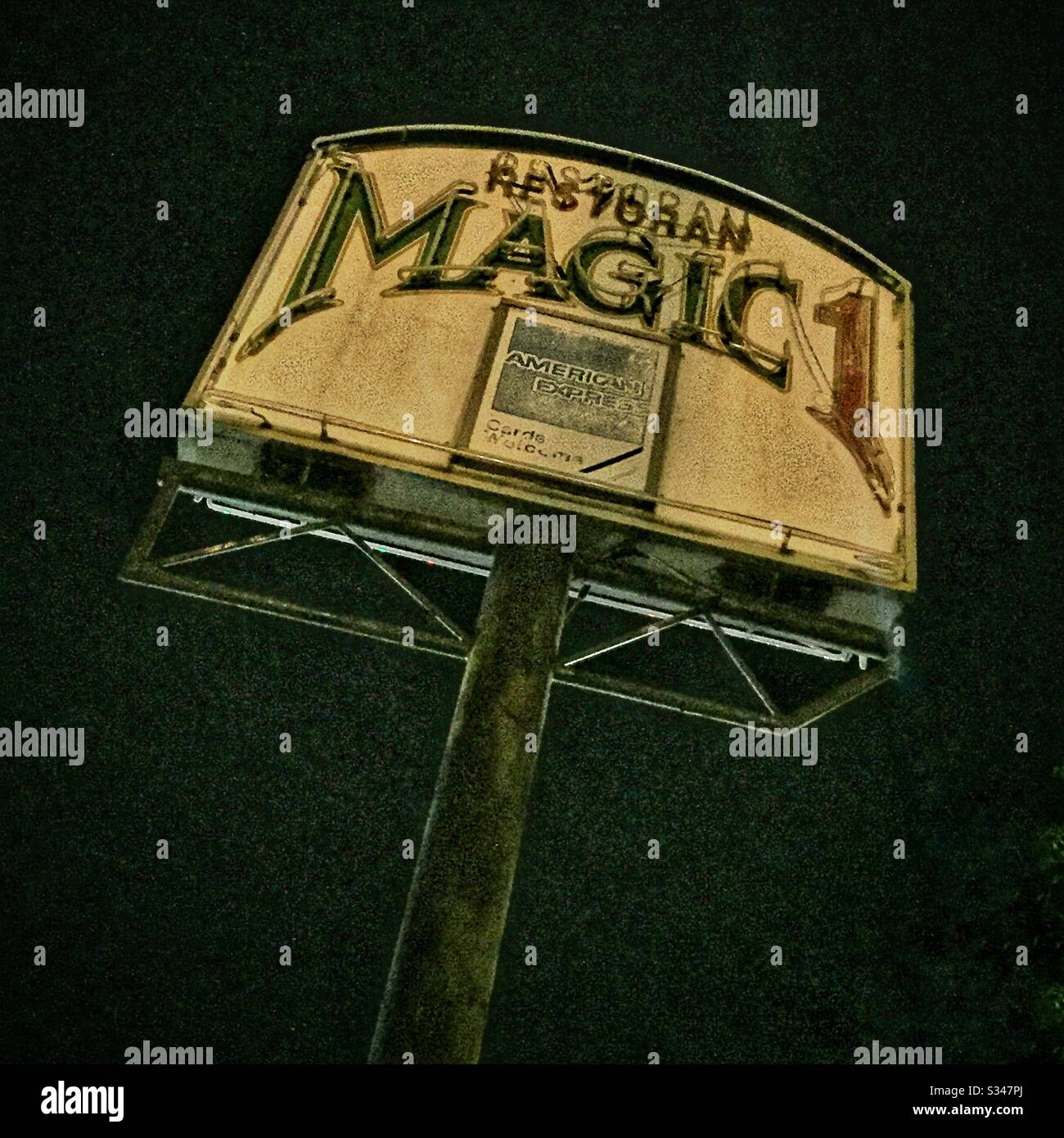 Unlit old-style neon sign for the Magic 1 restaurant at night, Batu ...