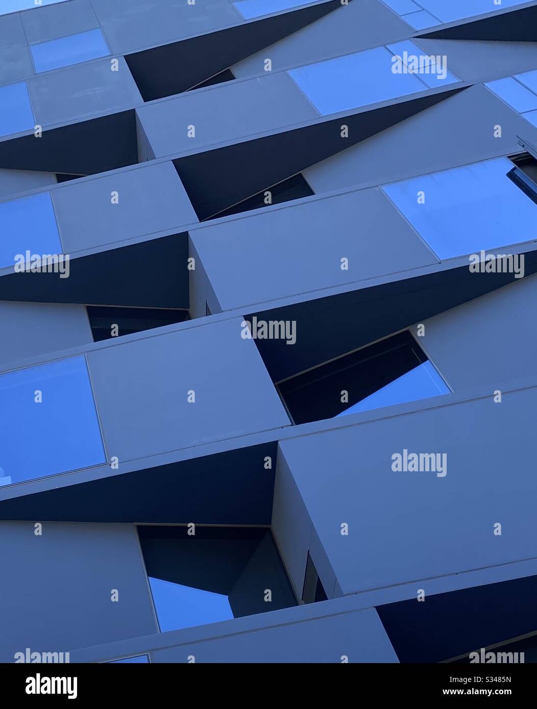 Abstract of blue balconies on a building Stock Photo - Alamy