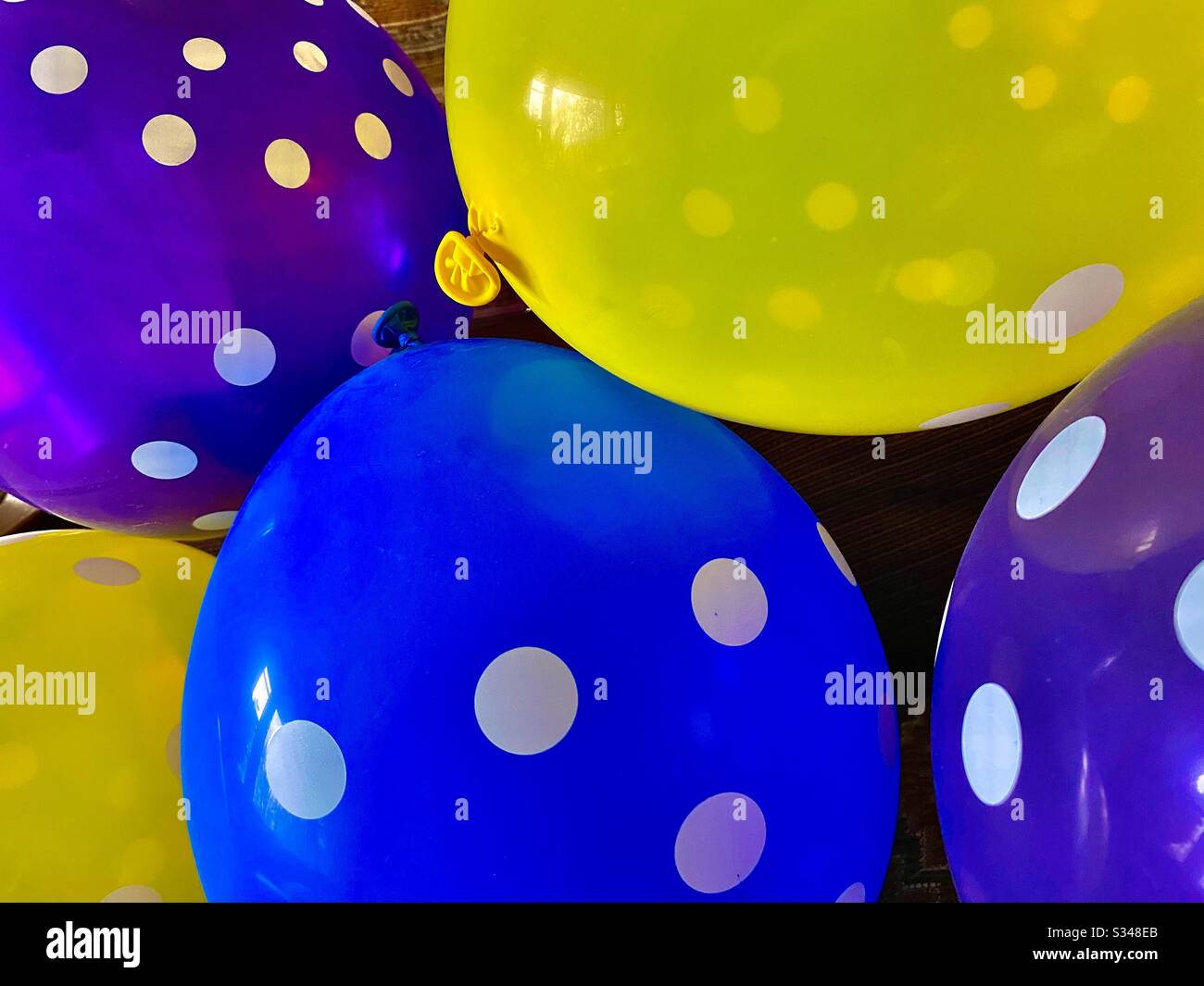Spotted birthday balloons Stock Photo - Alamy