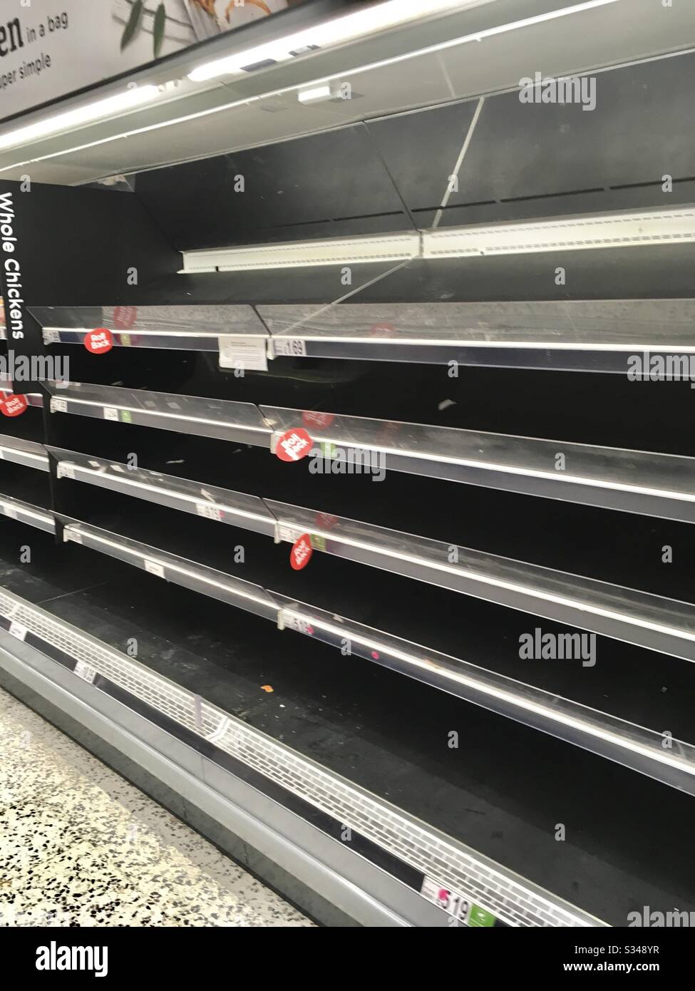 Asda empty shelves due to stockpiling Stock Photo - Alamy