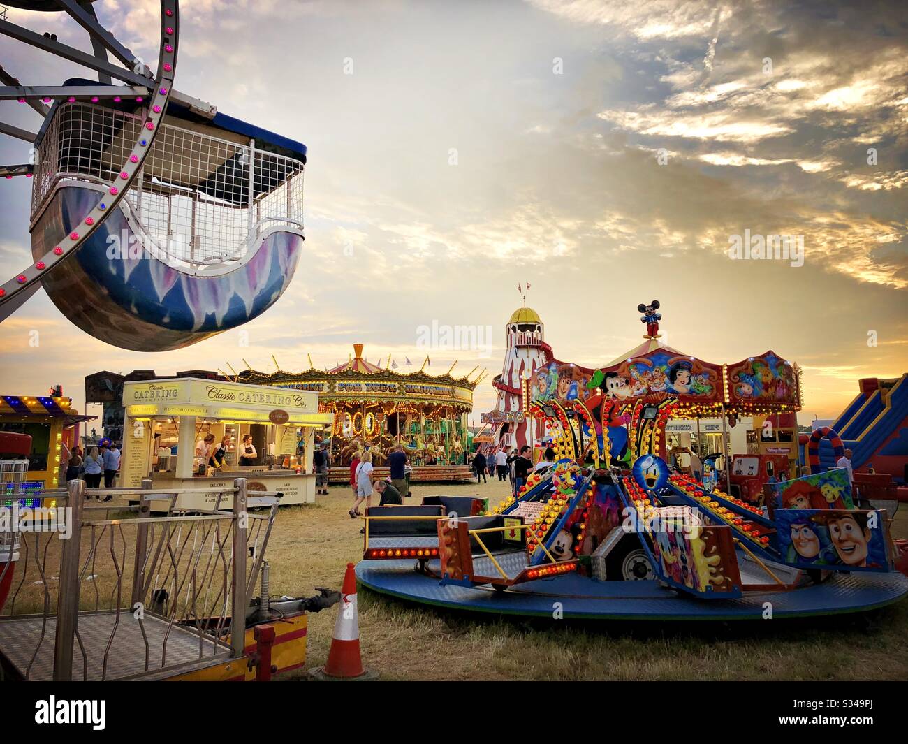 Fair ground ride at sunset hi-res stock photography and images - Alamy