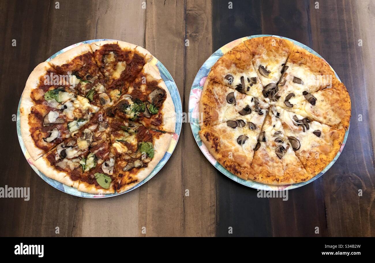 Two homemade pizza pies Stock Photo - Alamy