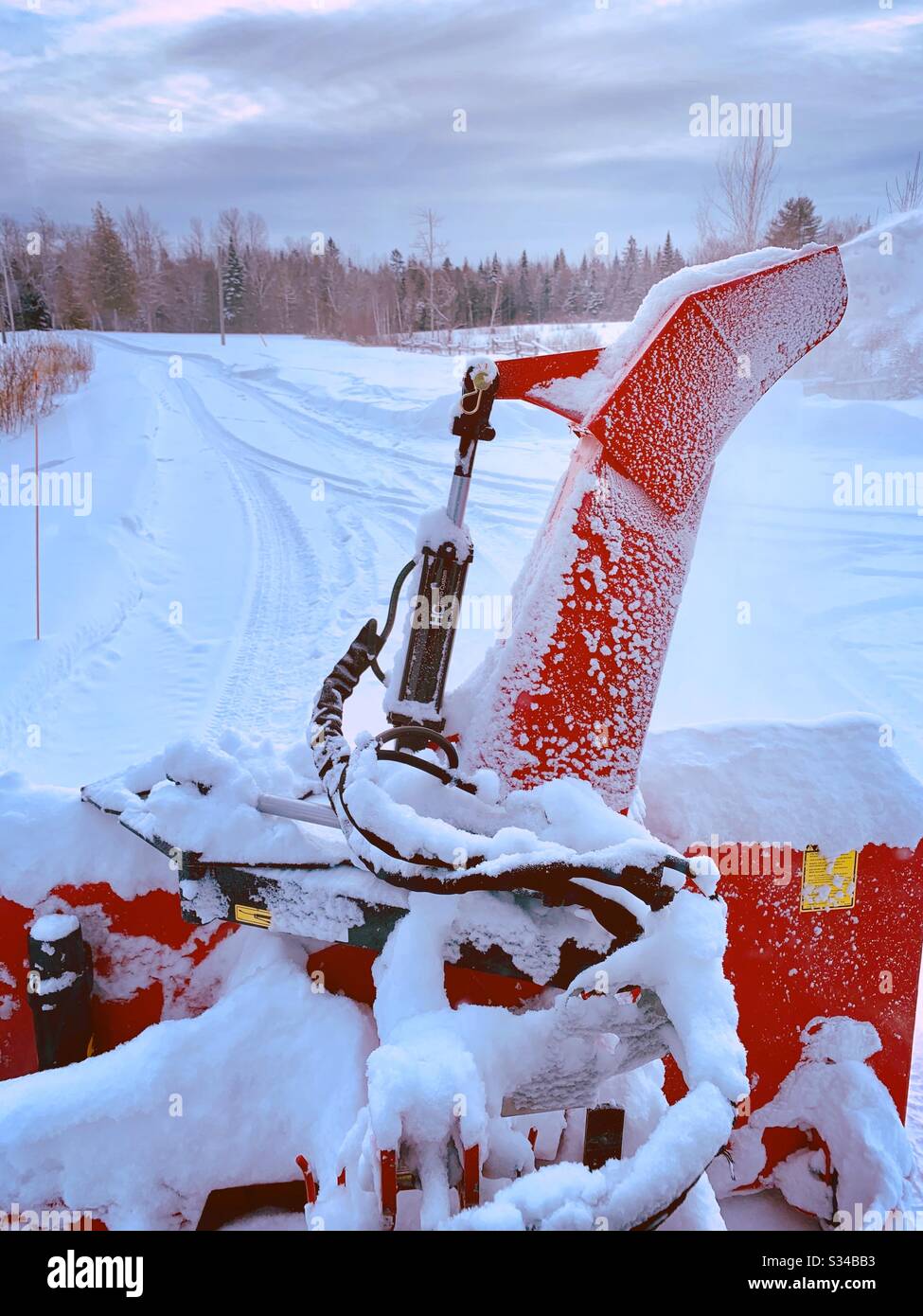 Snowblower in action Stock Photo - Alamy