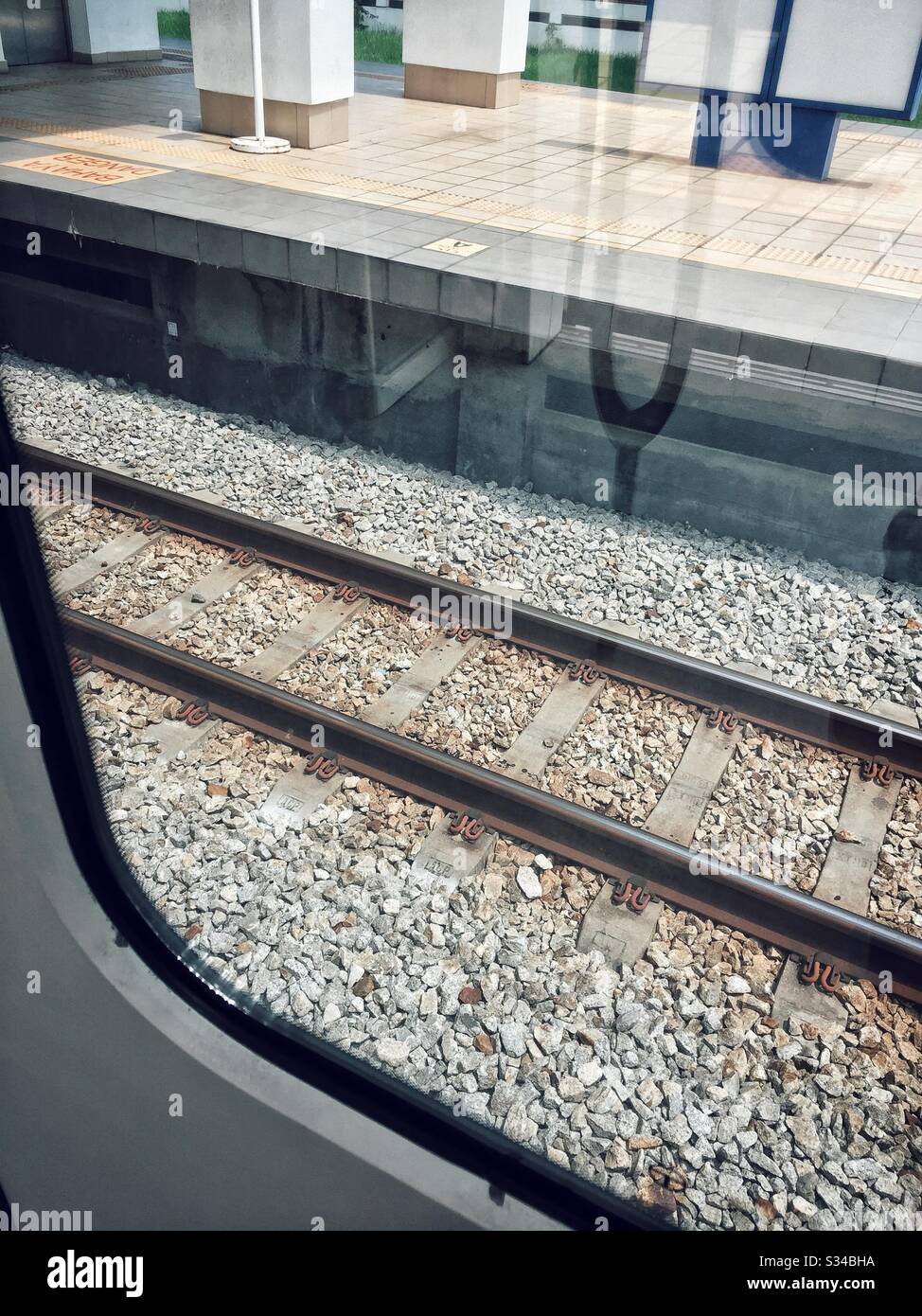 Train track rail reflection hi-res stock photography and images - Alamy