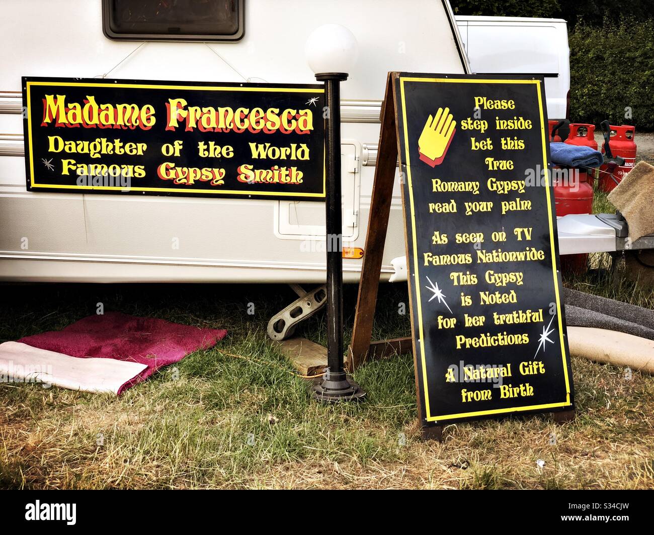 A close up shot of signs outside a gypsy caravan at a travelling ...