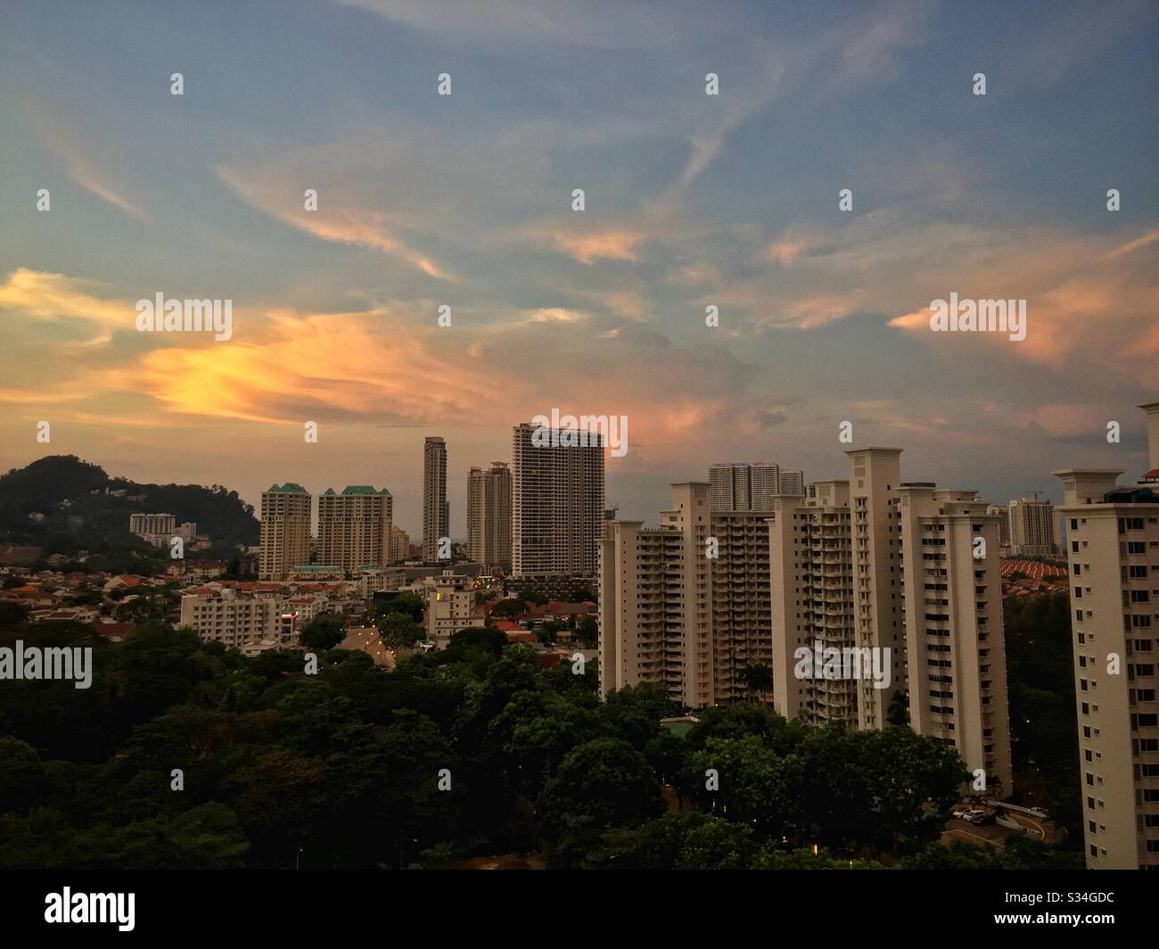 Condominioms at tanjong tokong road penang at dusk Stock Photo - Alamy