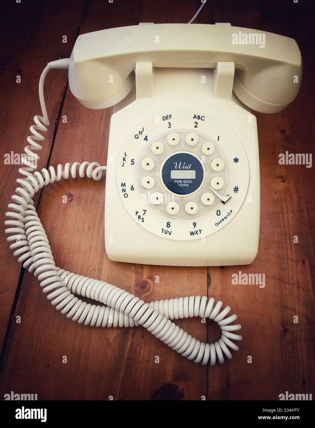 Old style telephone on wooden background Stock Photo - Alamy