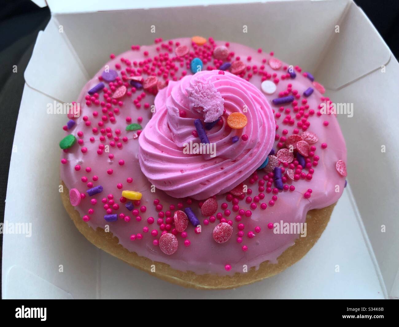 Image of a real pink donut hi-res stock photography and images - Alamy