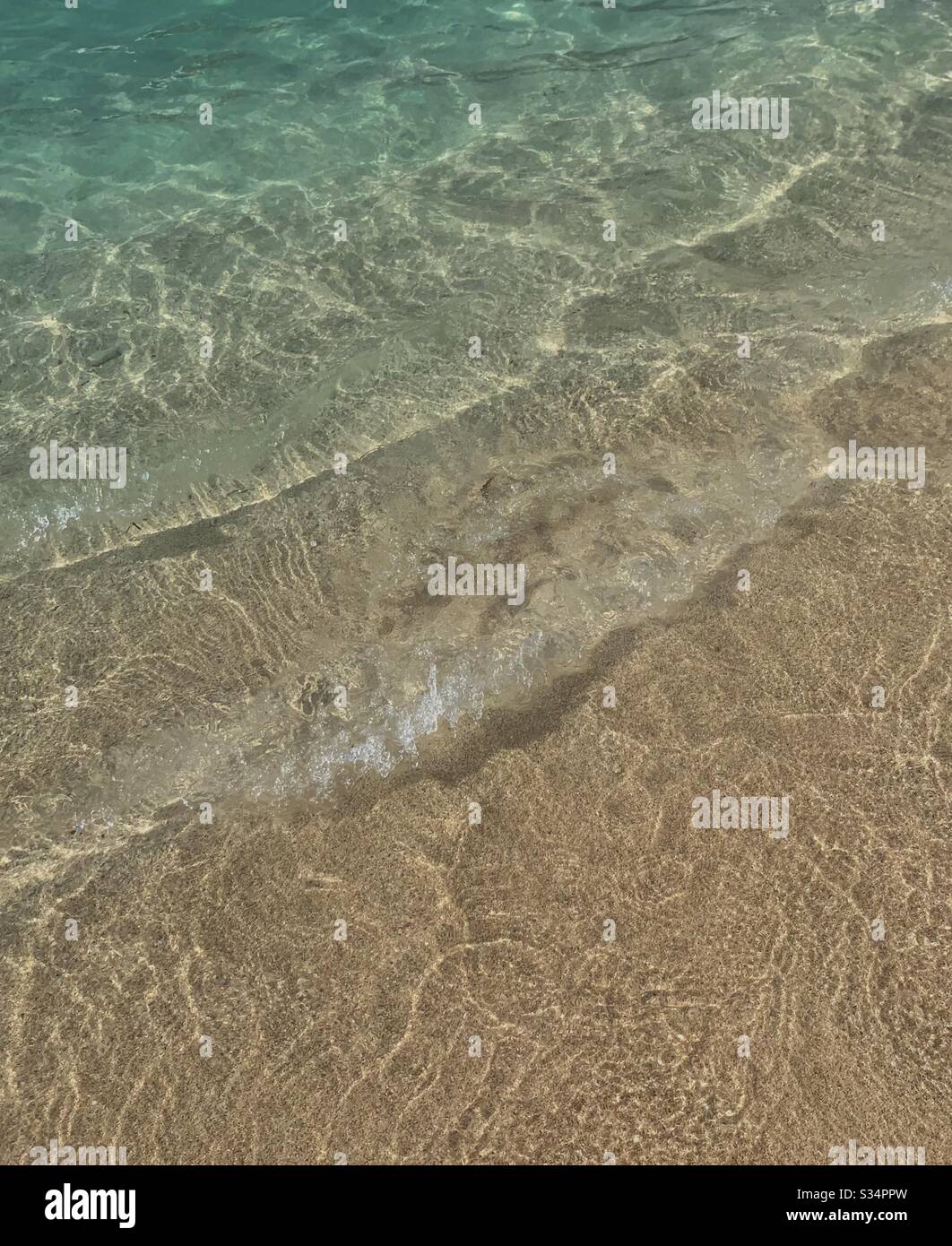 Ocean waves and sand hi-res stock photography and images - Alamy
