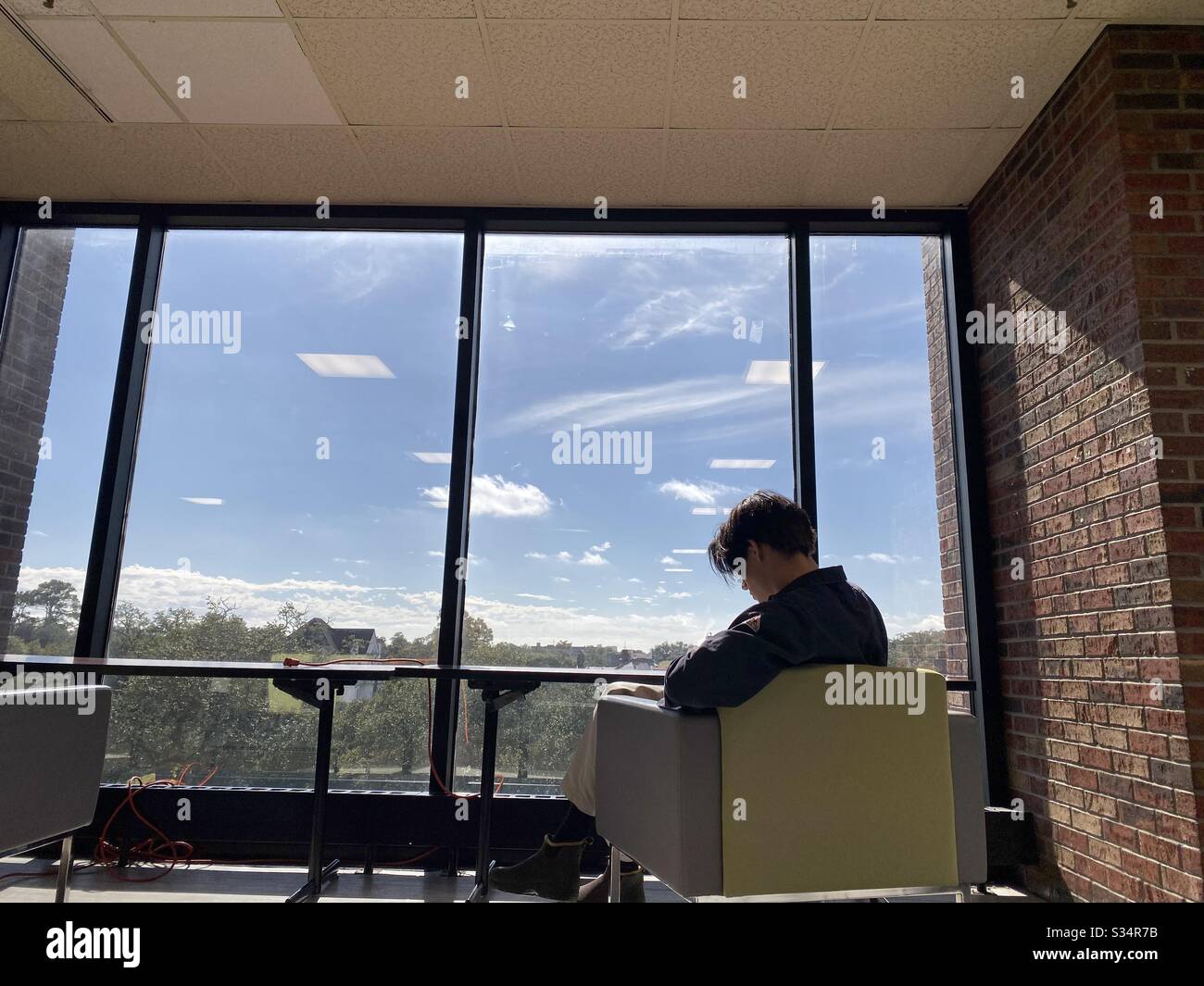 A college student thinking Stock Photo - Alamy
