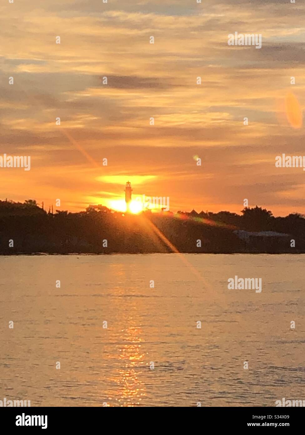 Lighthouse lens flare hi-res stock photography and images - Alamy