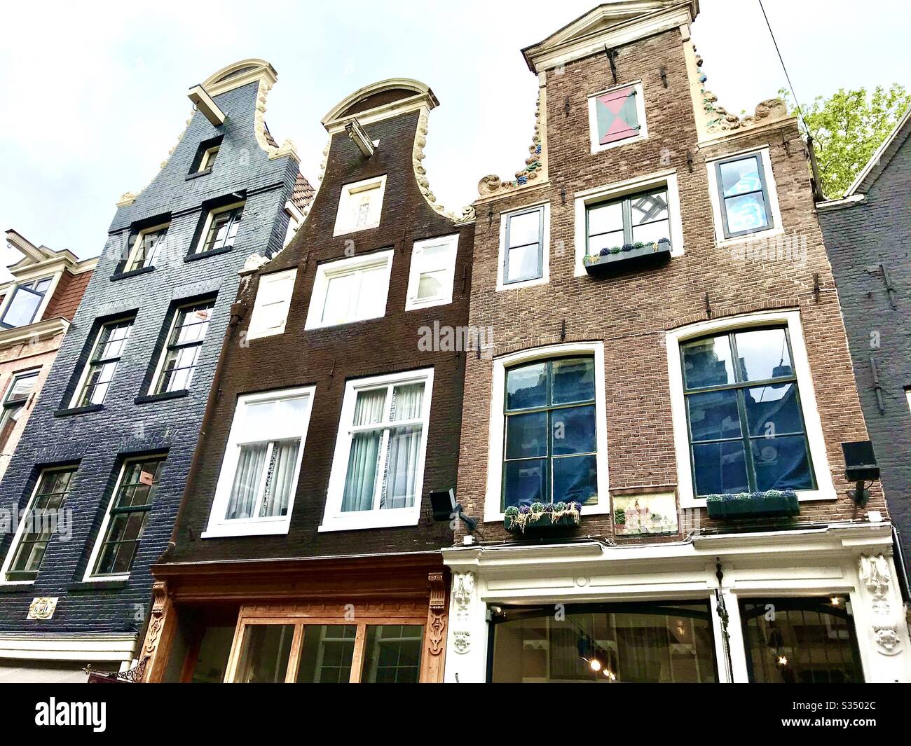 Amsterdam canal houses Stock Photo - Alamy