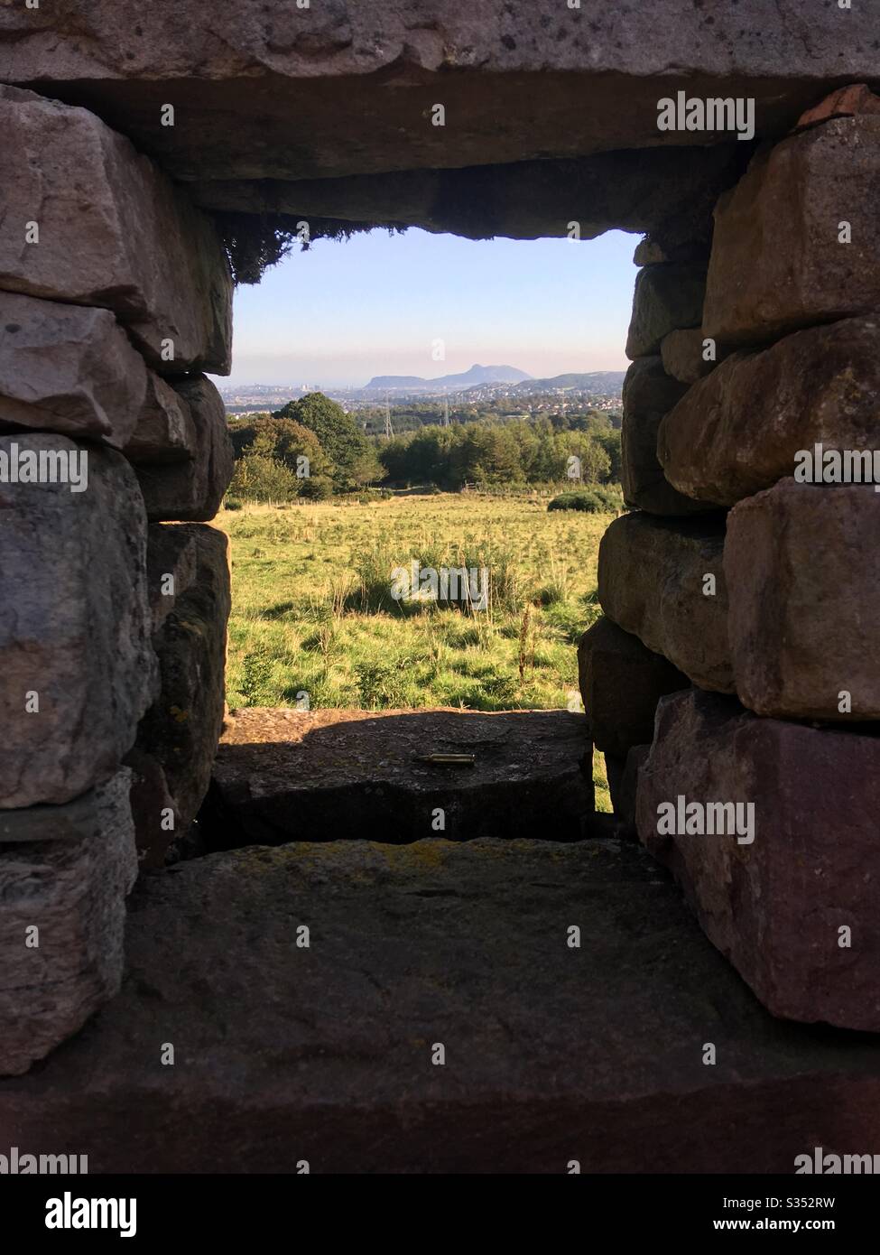 hilltop view through window Stock Photo - Alamy
