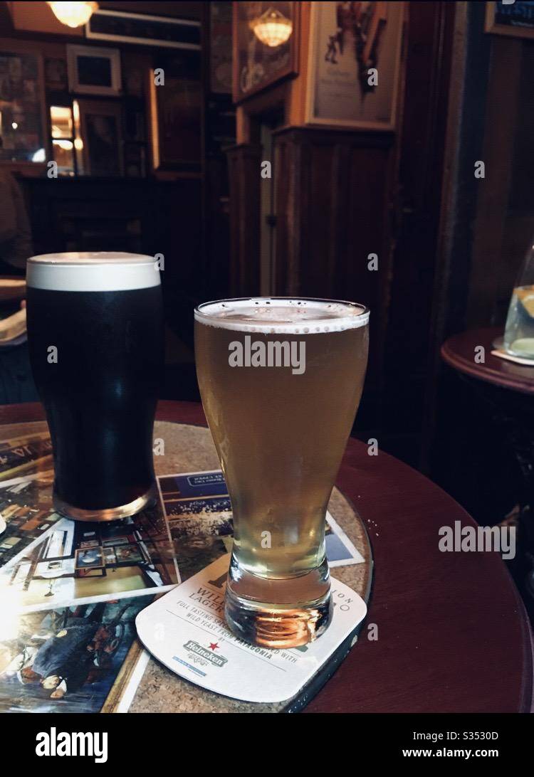 Guinness on table hi-res stock photography and images - Alamy
