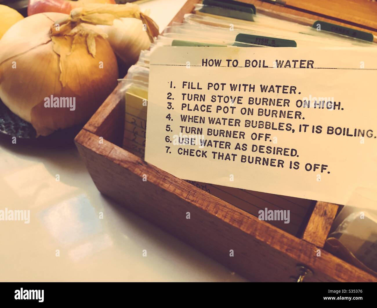 Recipe giving instruction on how to boil water in a handcrafted wooden ...