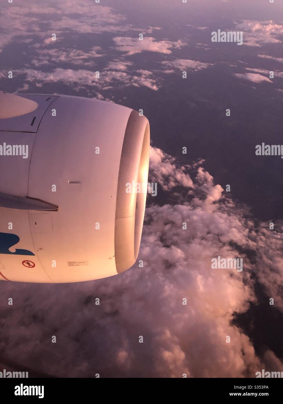 Romantic pink sky flying over Brazil Stock Photo - Alamy