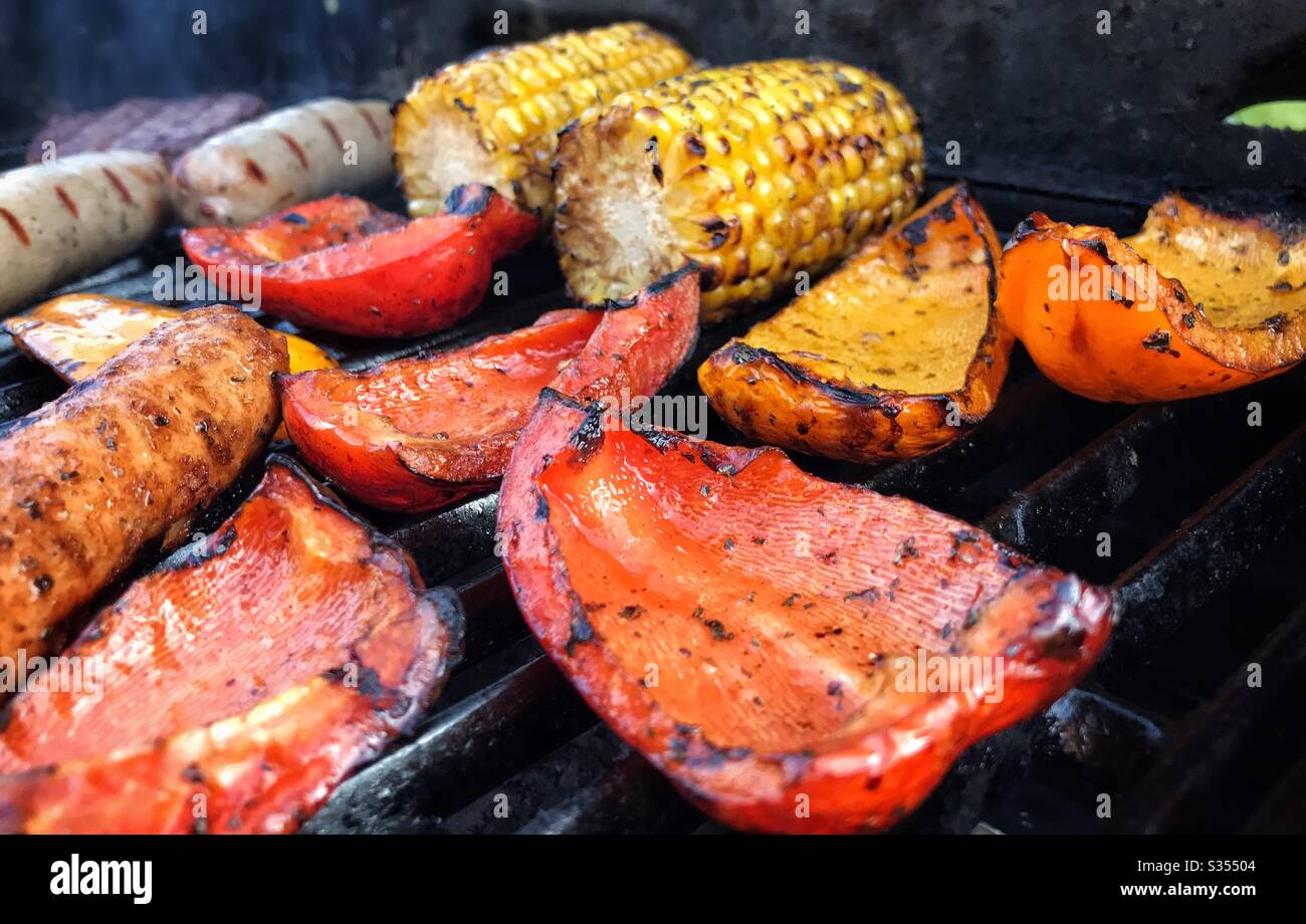 BBQ food on grill being cooked Stock Photo - Alamy