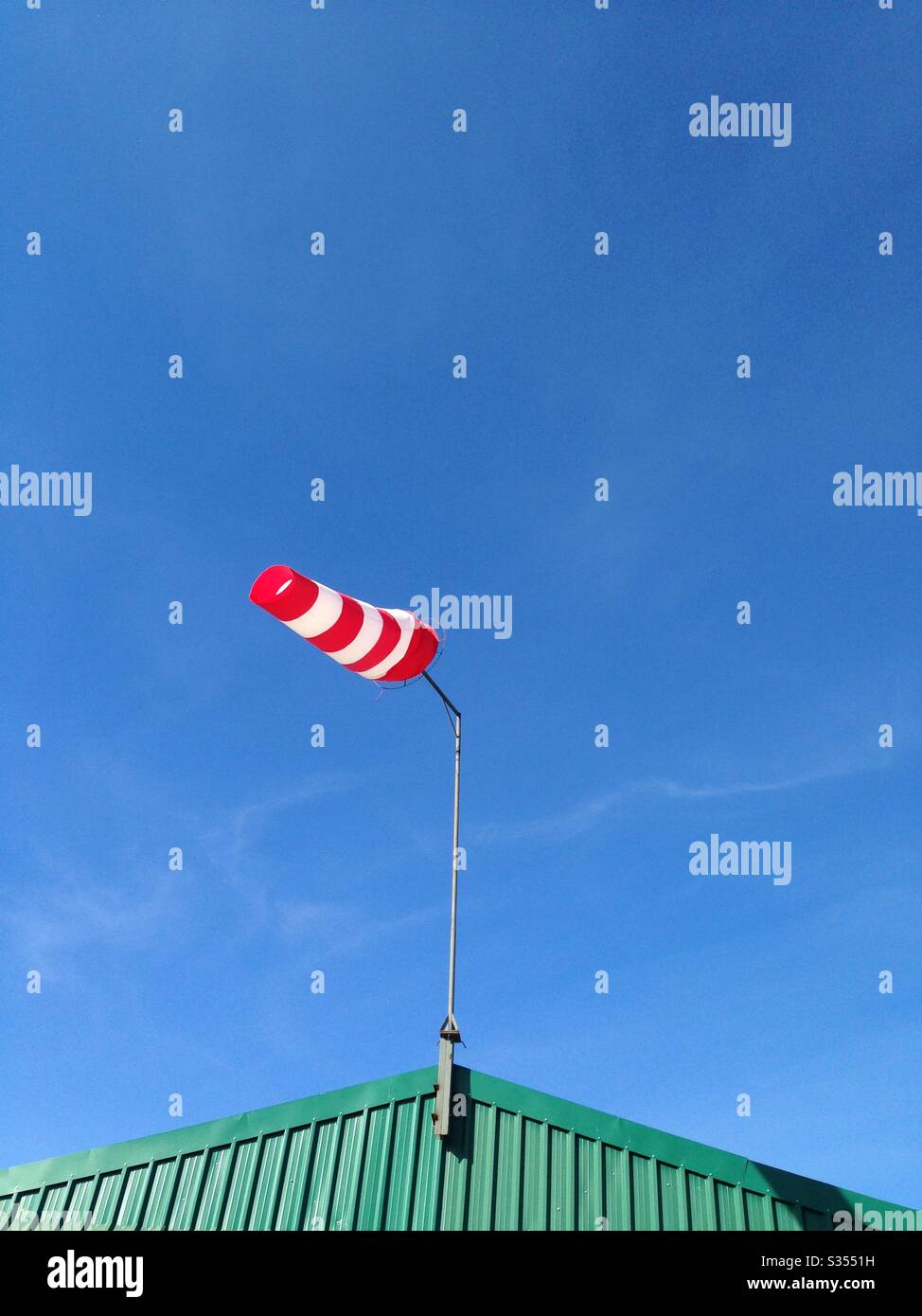 Windsock in strong wind Stock Photo - Alamy