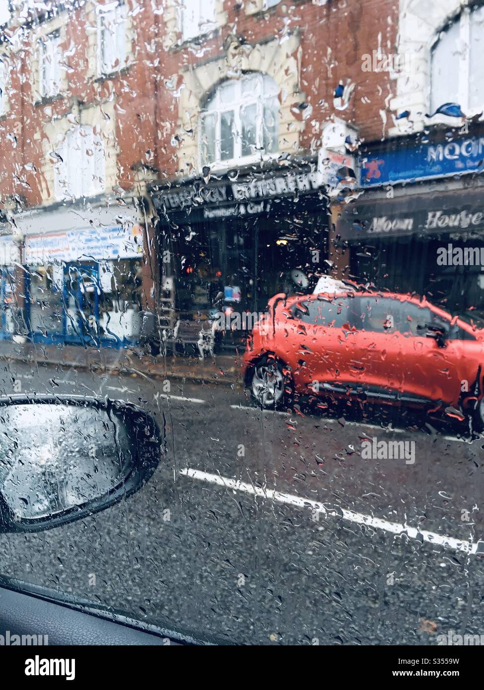 Car through rainy window hi-res stock photography and images - Alamy