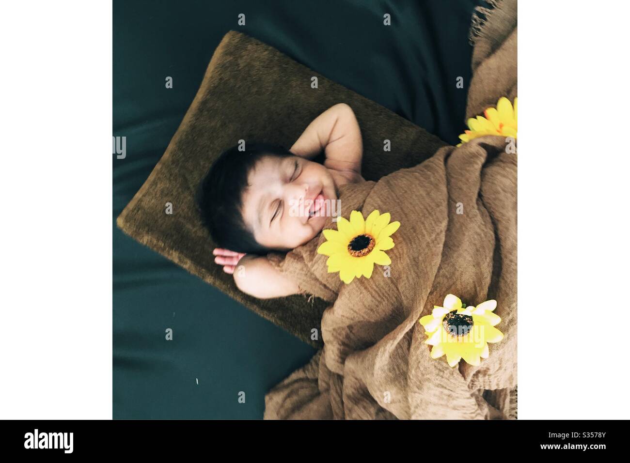 Baby smile while sleeping hi-res stock photography and images - Alamy