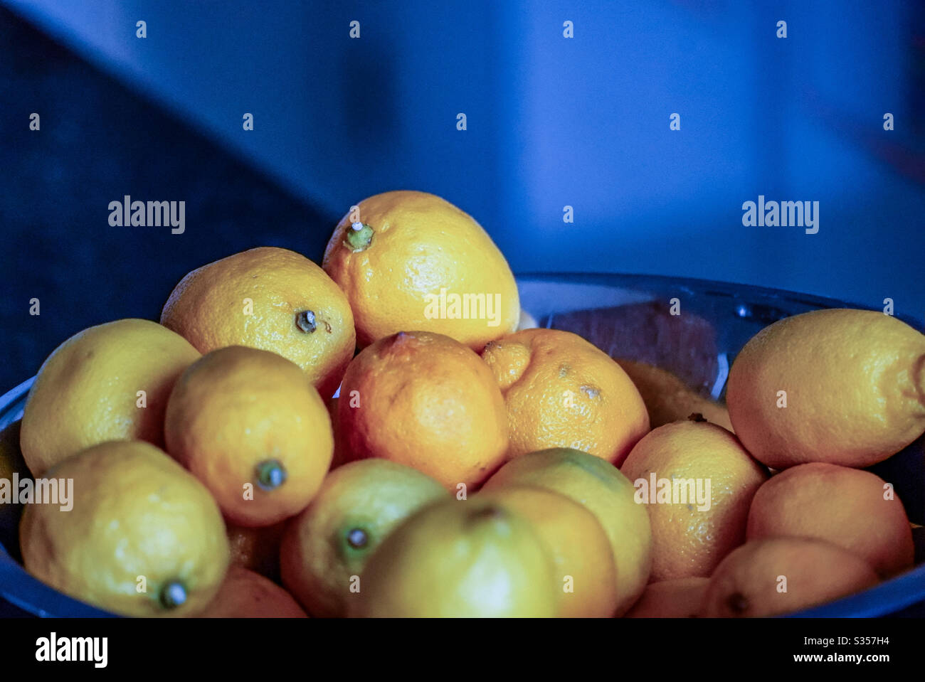 Bowl full of lemons Stock Photo - Alamy