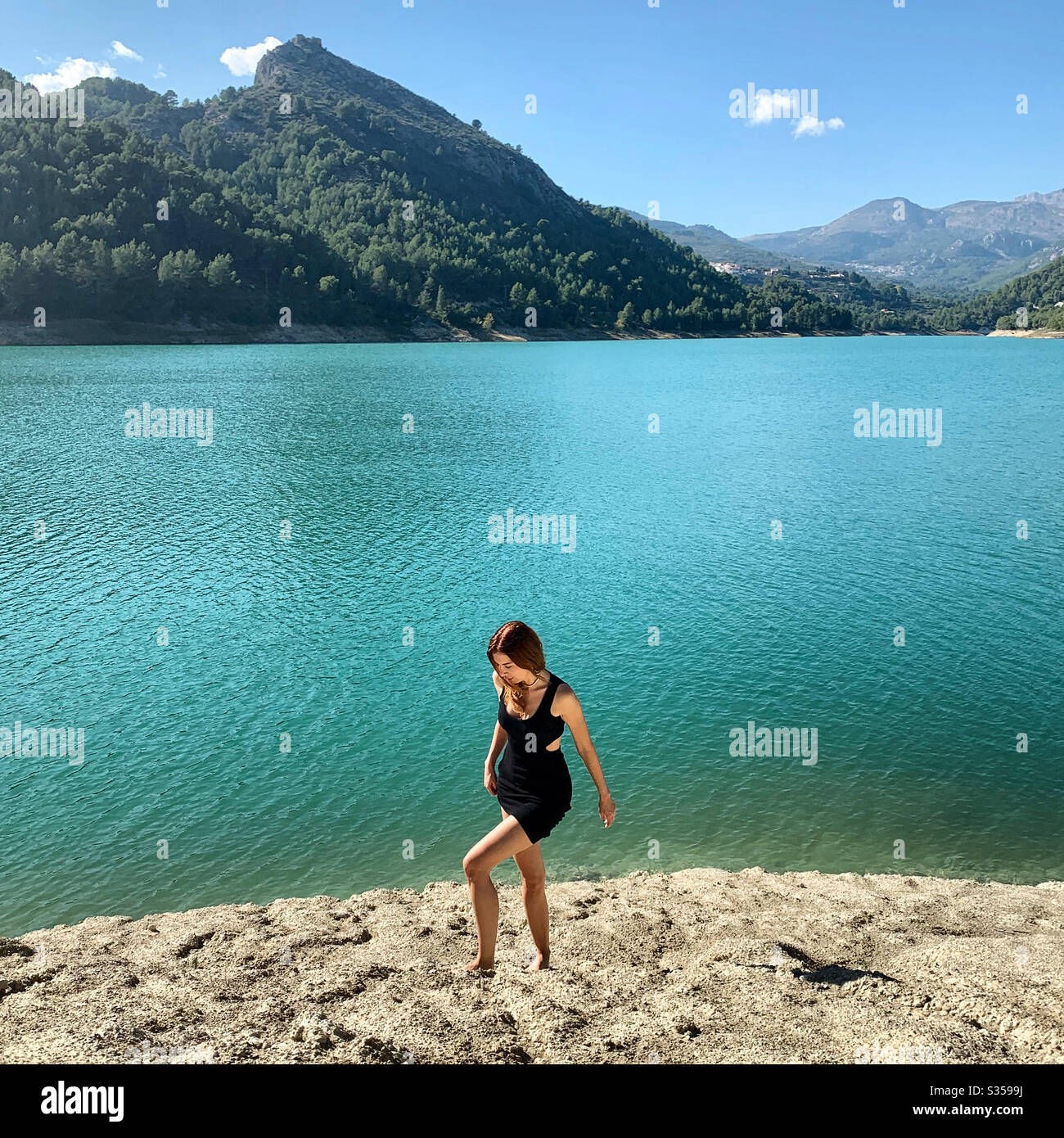 Woman lake hi-res stock photography and images - Alamy