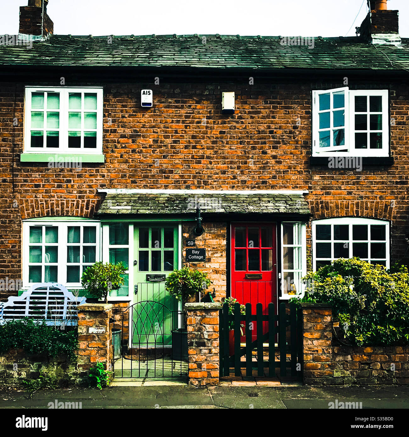 Quaint house front doors Stock Photo - Alamy
