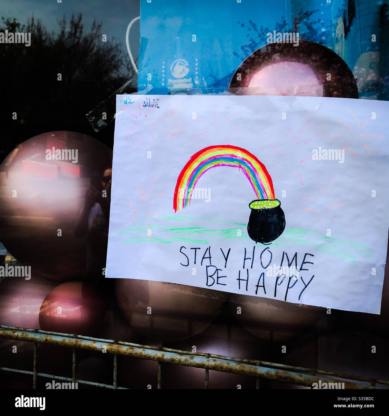 Rainbow in window during Covid lockdown Stock Photo - Alamy