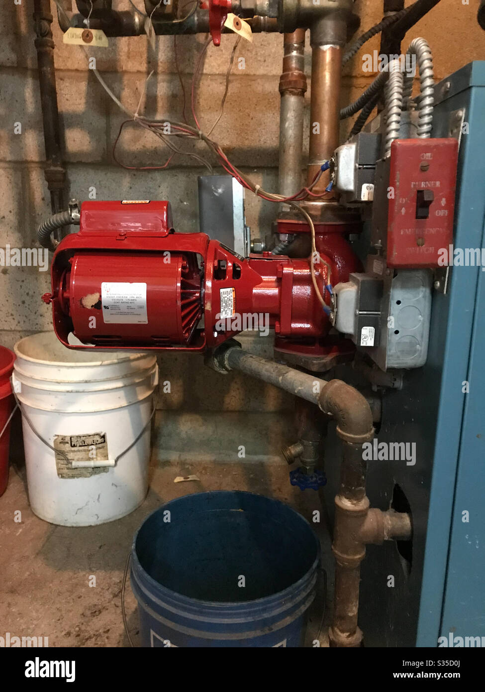 Red furnace pump for heater Stock Photo - Alamy