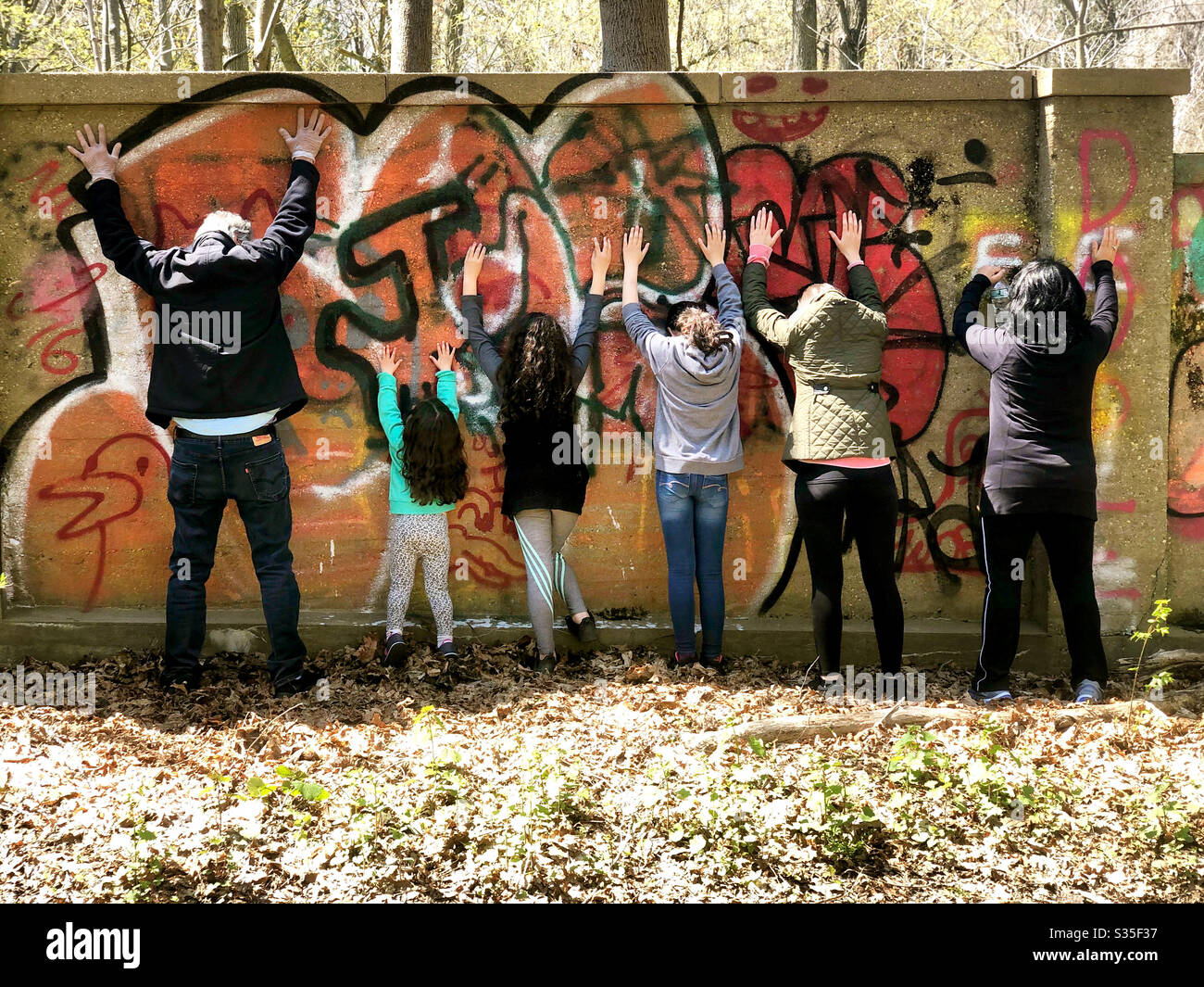 Family family line up hi-res stock photography and images - Alamy