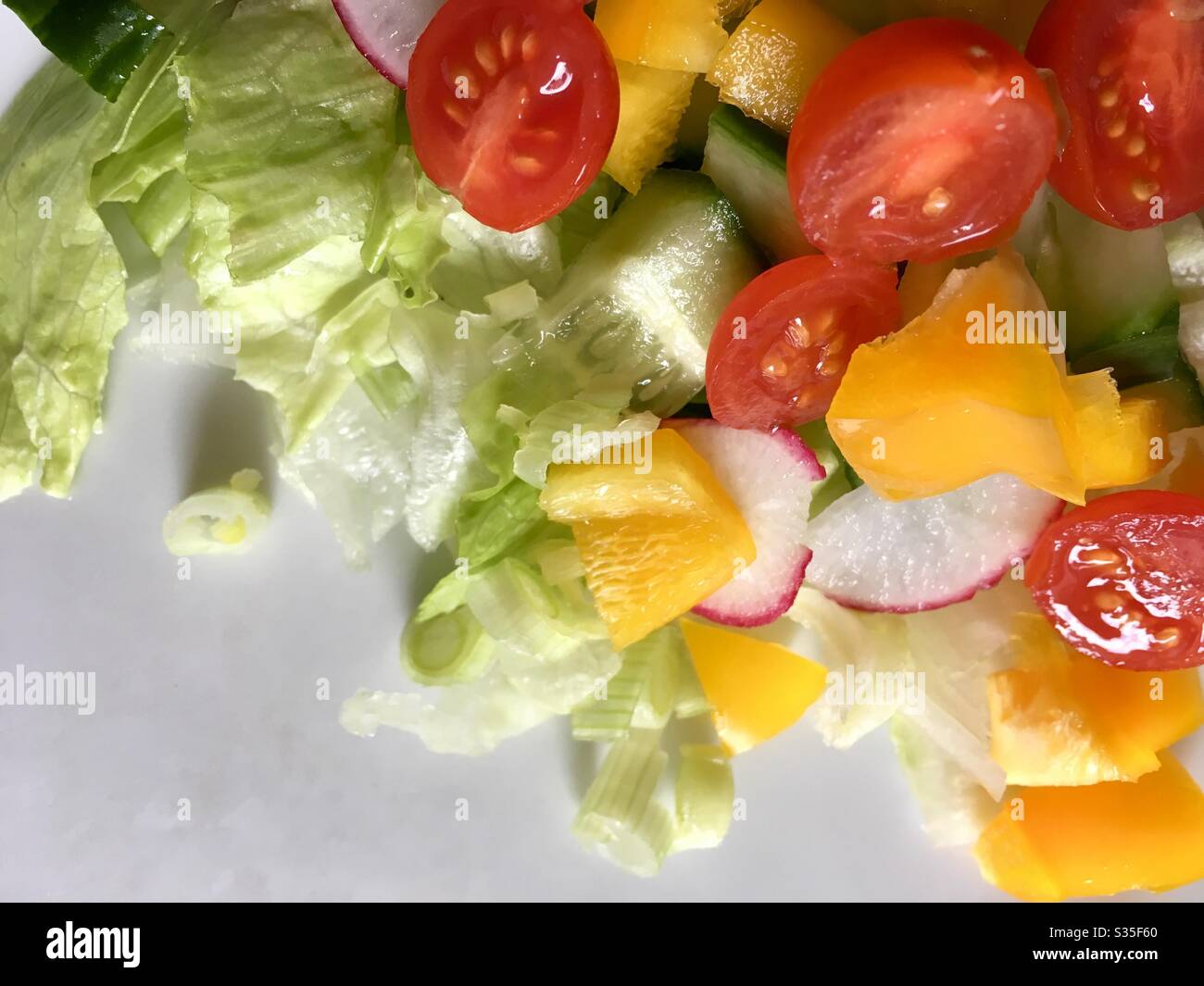 Fresh salad on a plate Stock Photo - Alamy