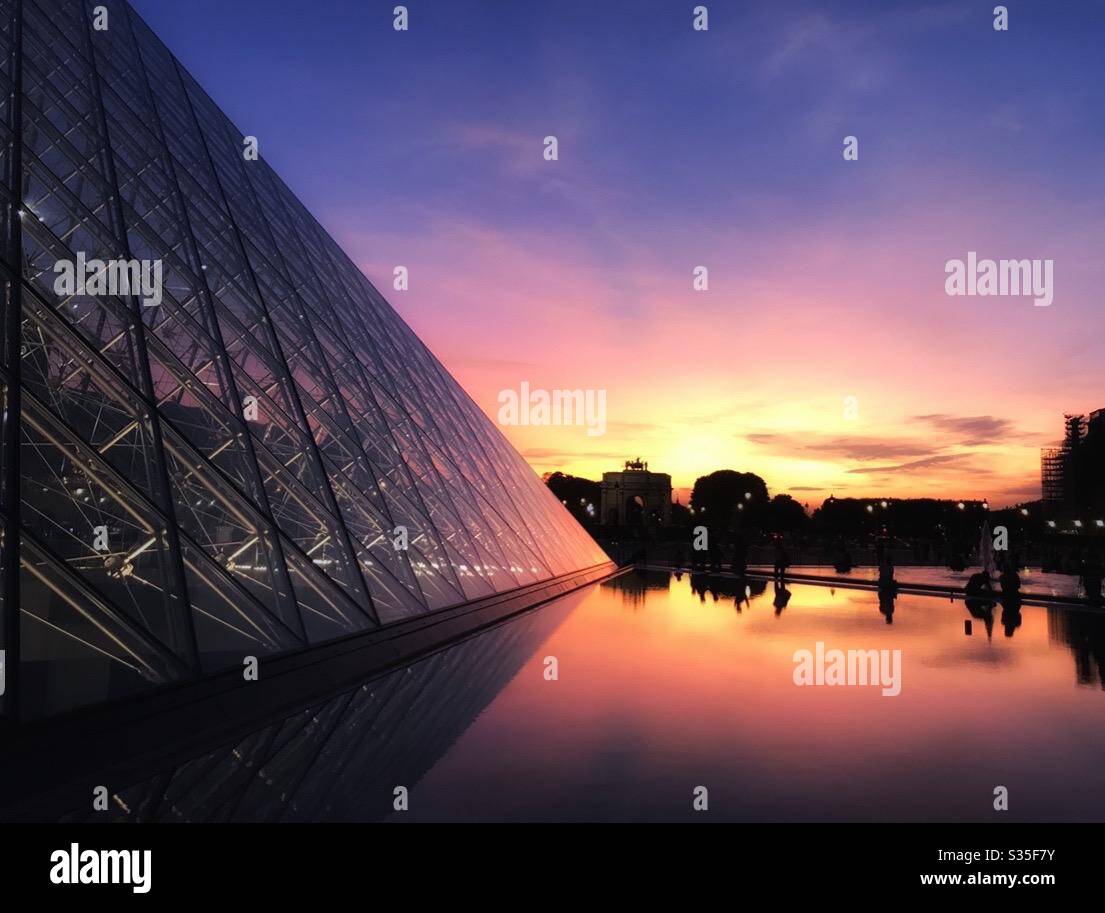 Louvre pyramid sunset hi-res stock photography and images - Alamy