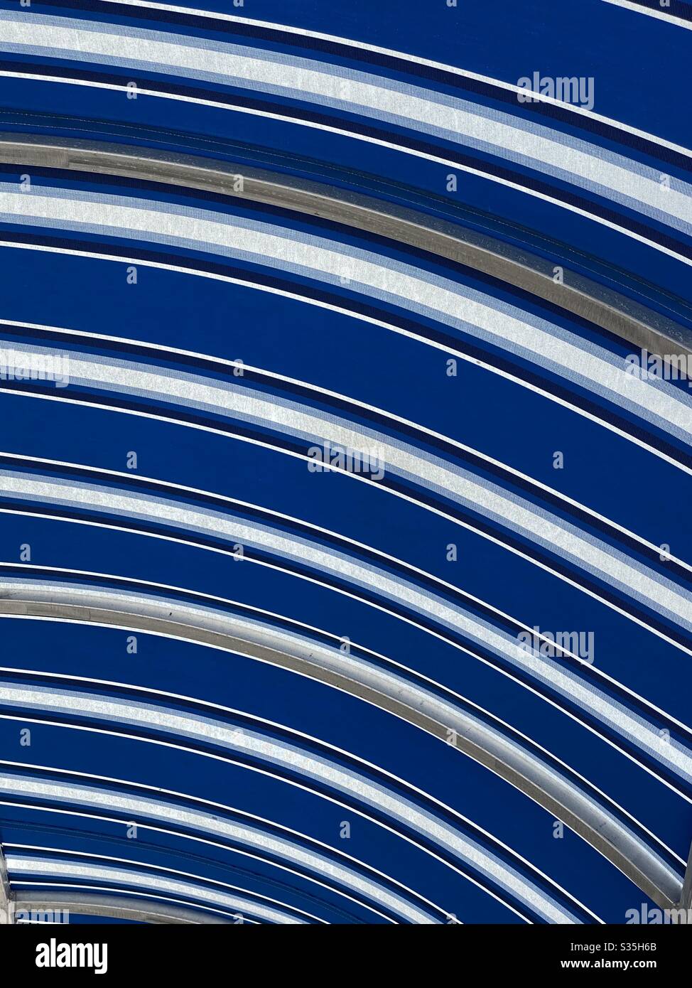 Abstract background textures and patterns of a colorful outdoor awning ...