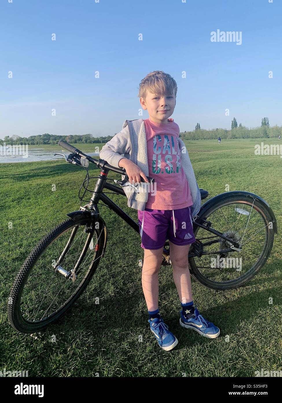 Boy on his bike hi-res stock photography and images - Alamy