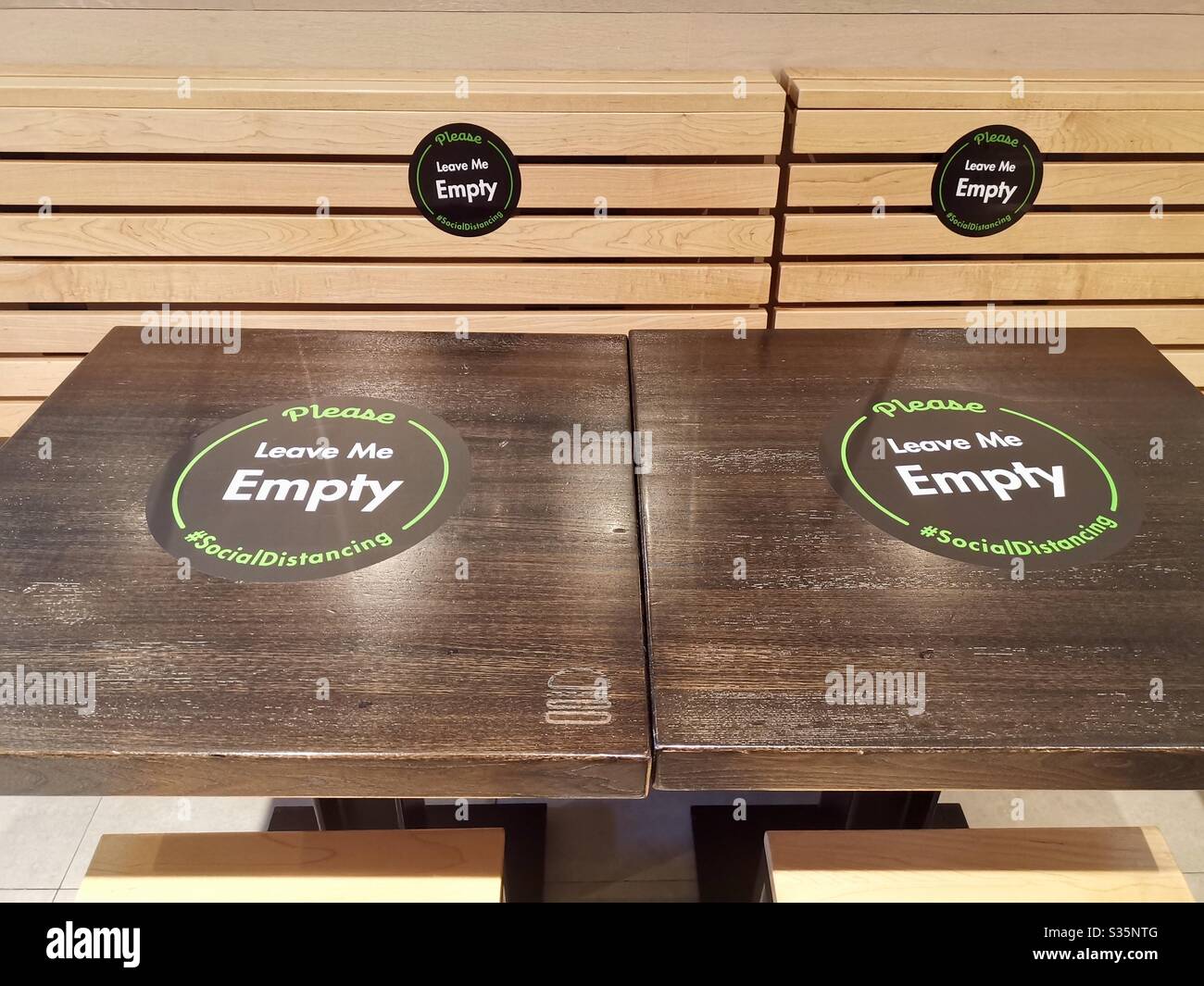 Social distancing in Hong Kong. Dining tables closed off for customers ...