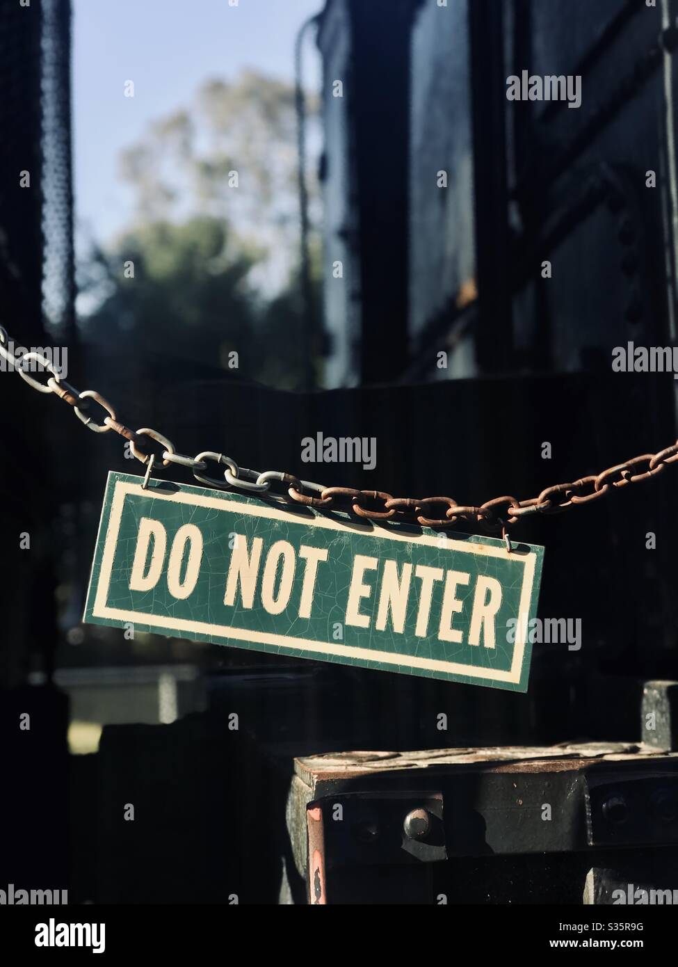 Hanging sign chain hi-res stock photography and images - Alamy