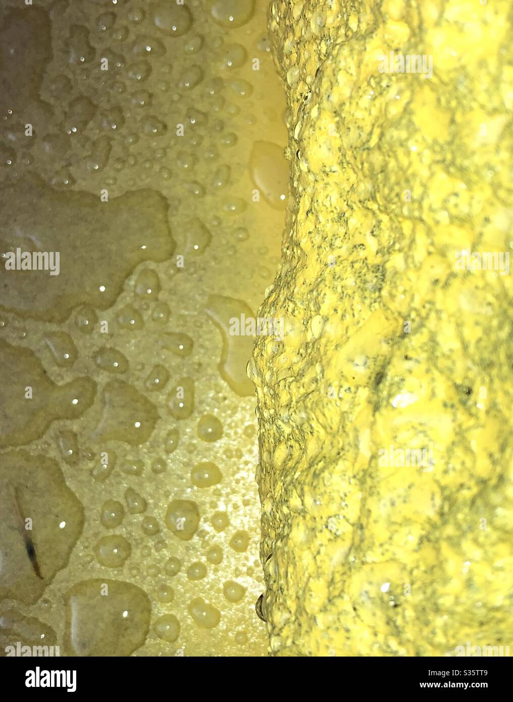 Painted boulder following an overnight rain - background Stock Photo ...